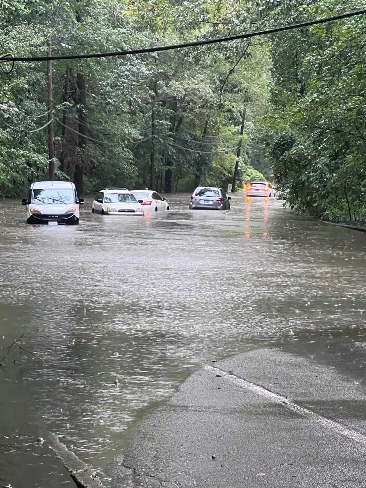 Storm Aftermath Clean Up Begins After Heavy Rain Causes Evacuations