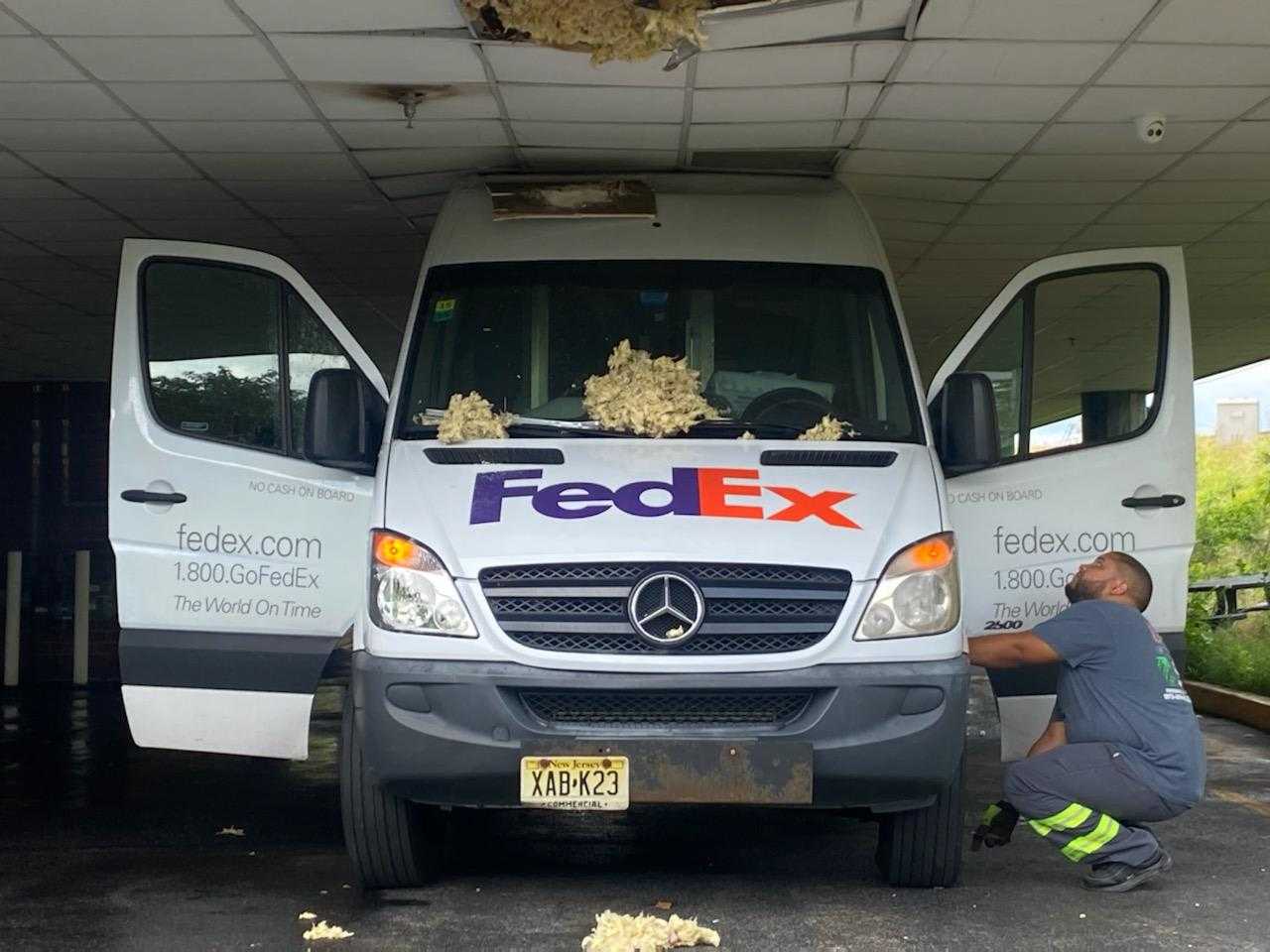 FedEx Van Gets Wedged Under Glen Rock Building: Guess How They Got It ...