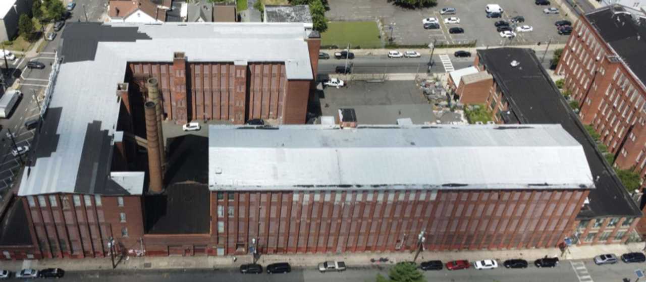 Iconic Paterson Warehouse With Giant Route 80 Sign Hits Market For $13M ...